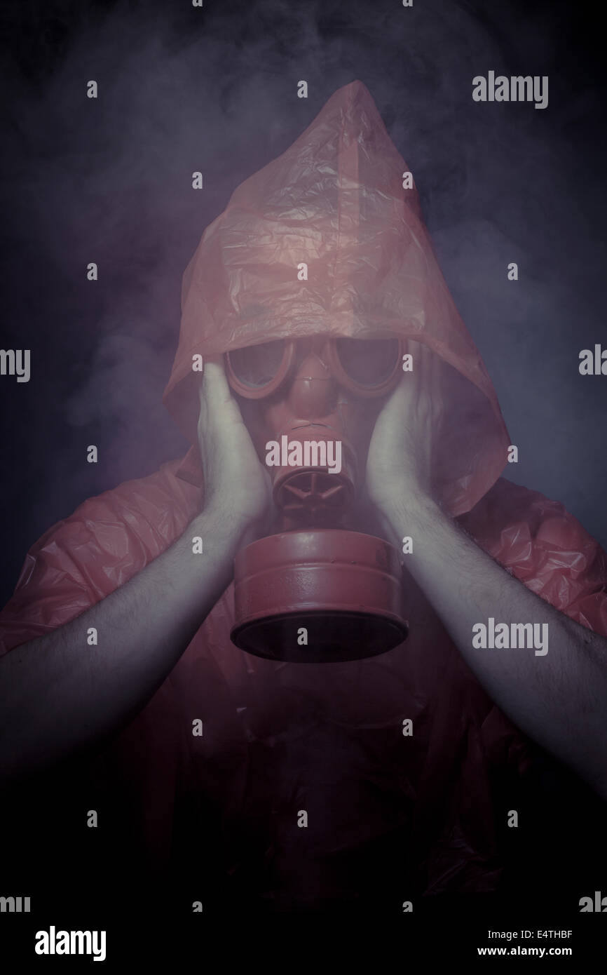 Hazard, nuclear disaster, man with red mask and plastic suit Stock ...