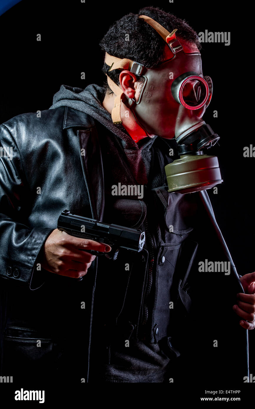 Officer, Private detective with bulletproof vest and gas mask Stock ...