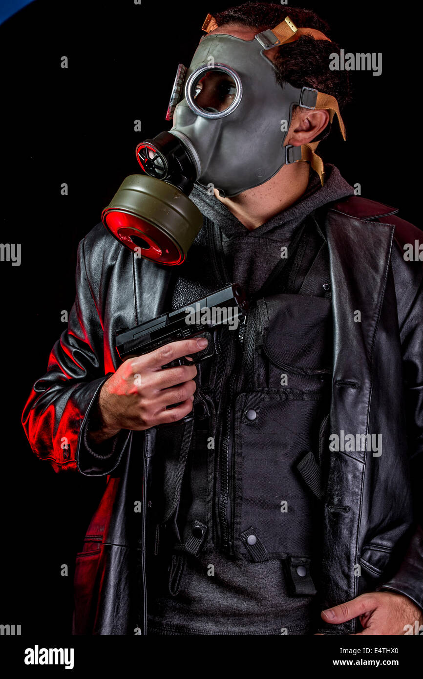 Private detective with bulletproof vest and gas mask Stock Photo - Alamy