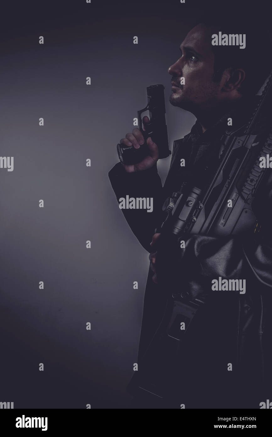 Detective, gangster with gun and pistol Stock Photo - Alamy