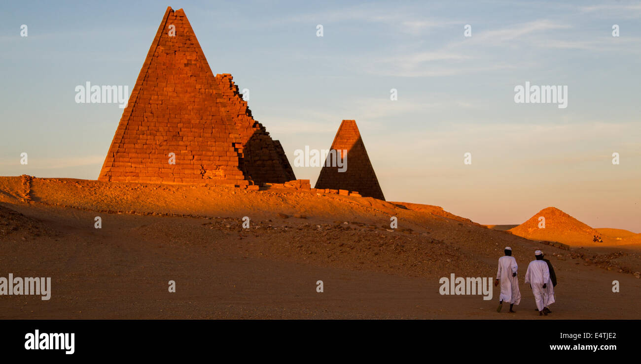 Men walking around Meroe pyramids in Sudan Stock Photo - Alamy