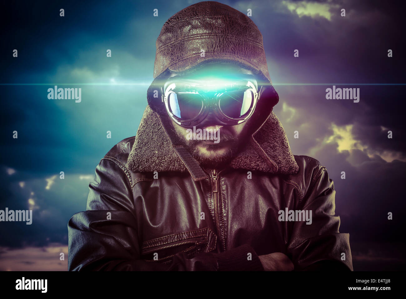 Captain, man dressed as pilot in helmet on clouds background. Vintage ...