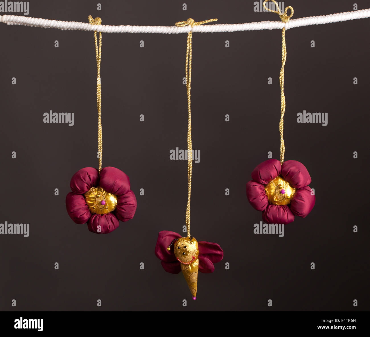 beautiful multi-colored children's soft toys on a rope isolated on a ...