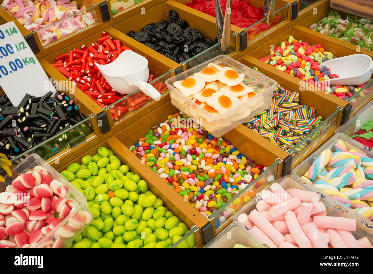 Assorted candy on display on a street market stall Stock Photo - Alamy