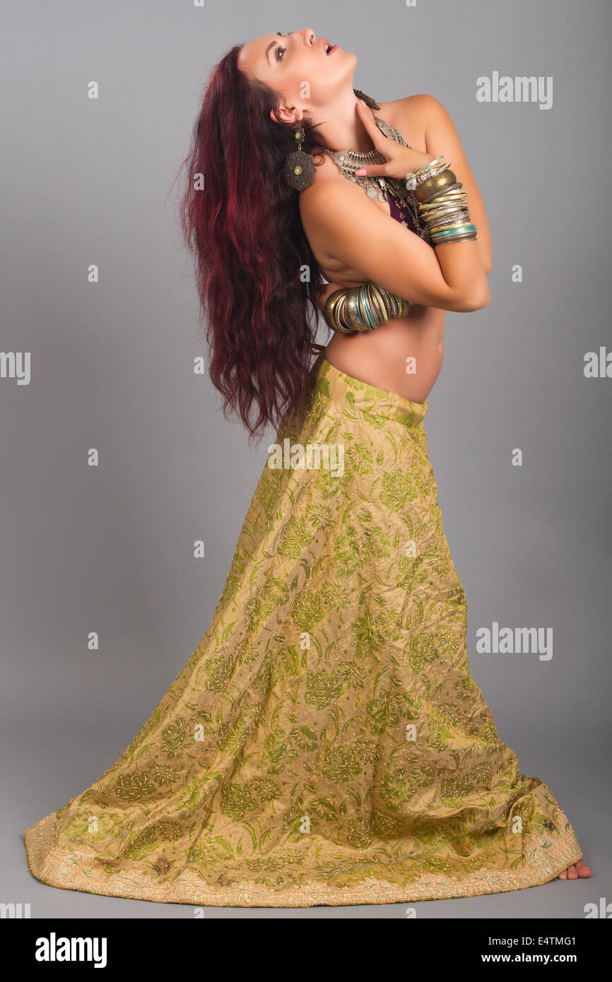 Beautiful girl belly dance movement, Young beautiful belly dancer in a ...