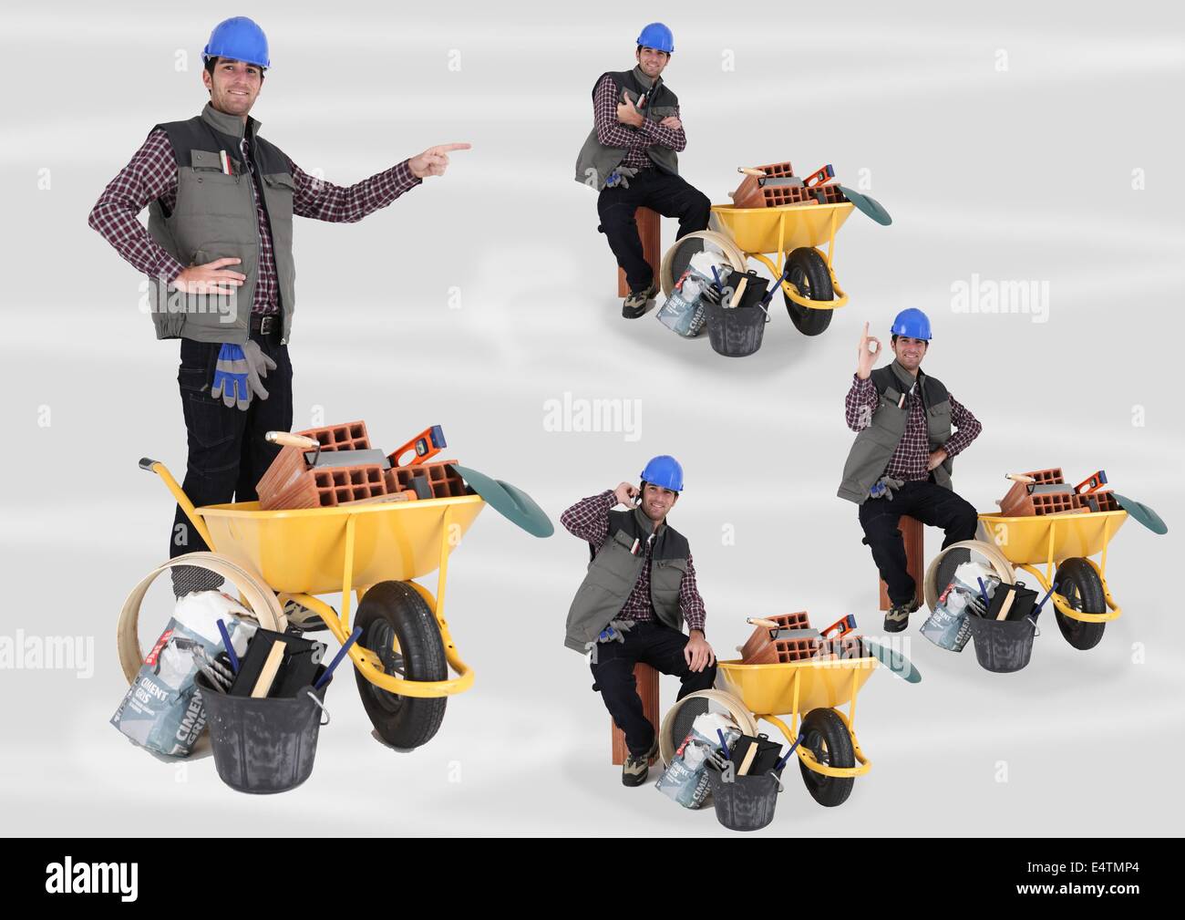 Mason transporting equipment in wheelbarrow Stock Photo - Alamy