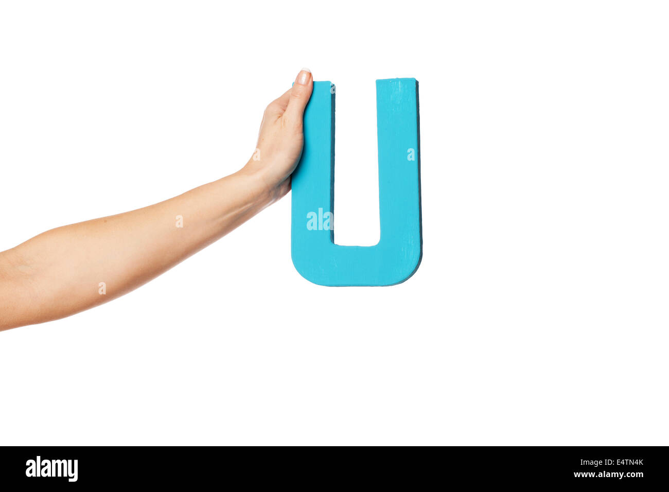 hand holding up the letter U from the left Stock Photo - Alamy