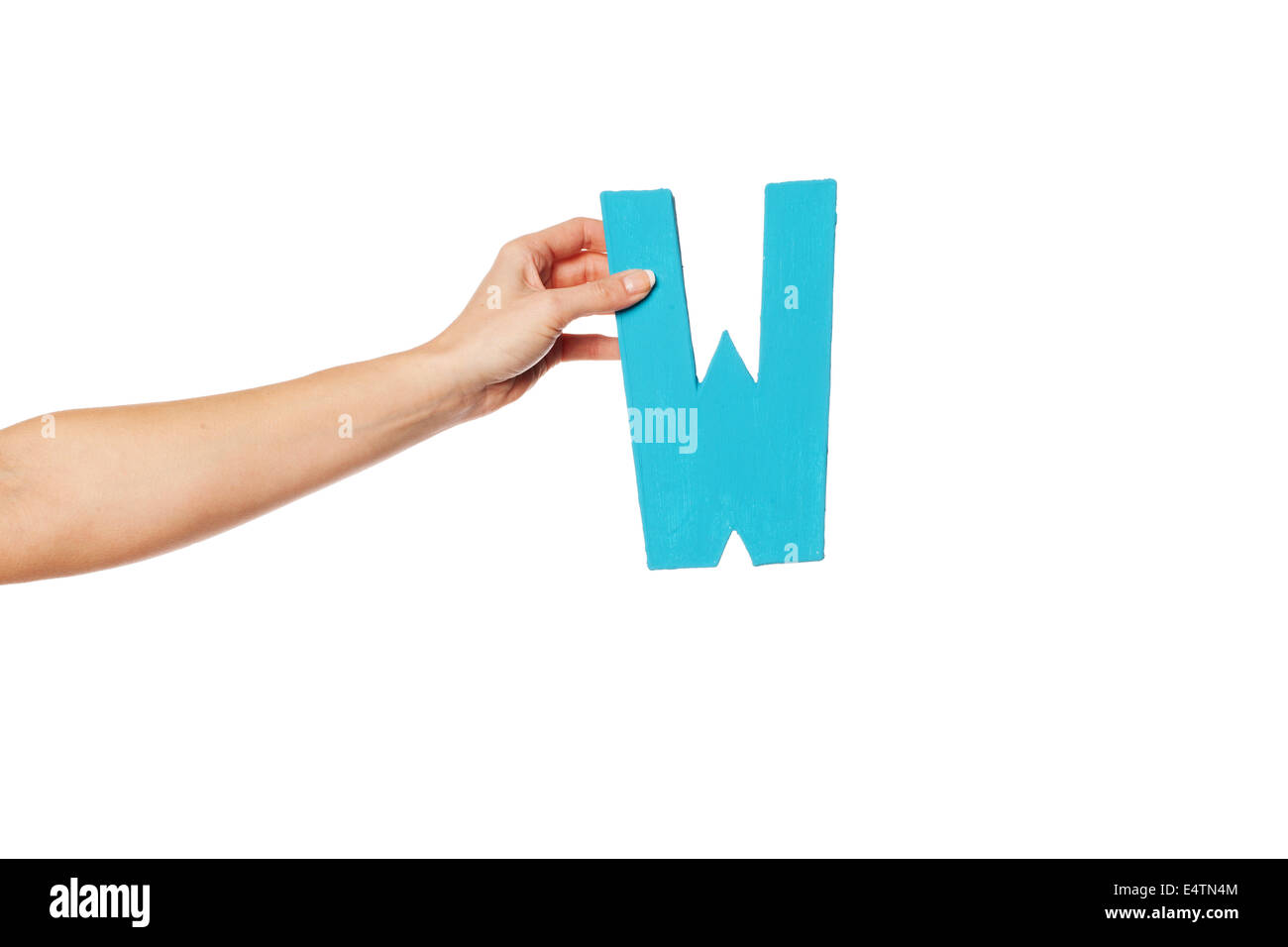 hand holding up the letter W from the left Stock Photo - Alamy