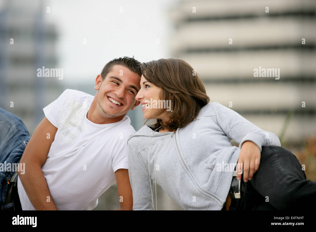 Couple sat down whilst sightseeing Stock Photo - Alamy