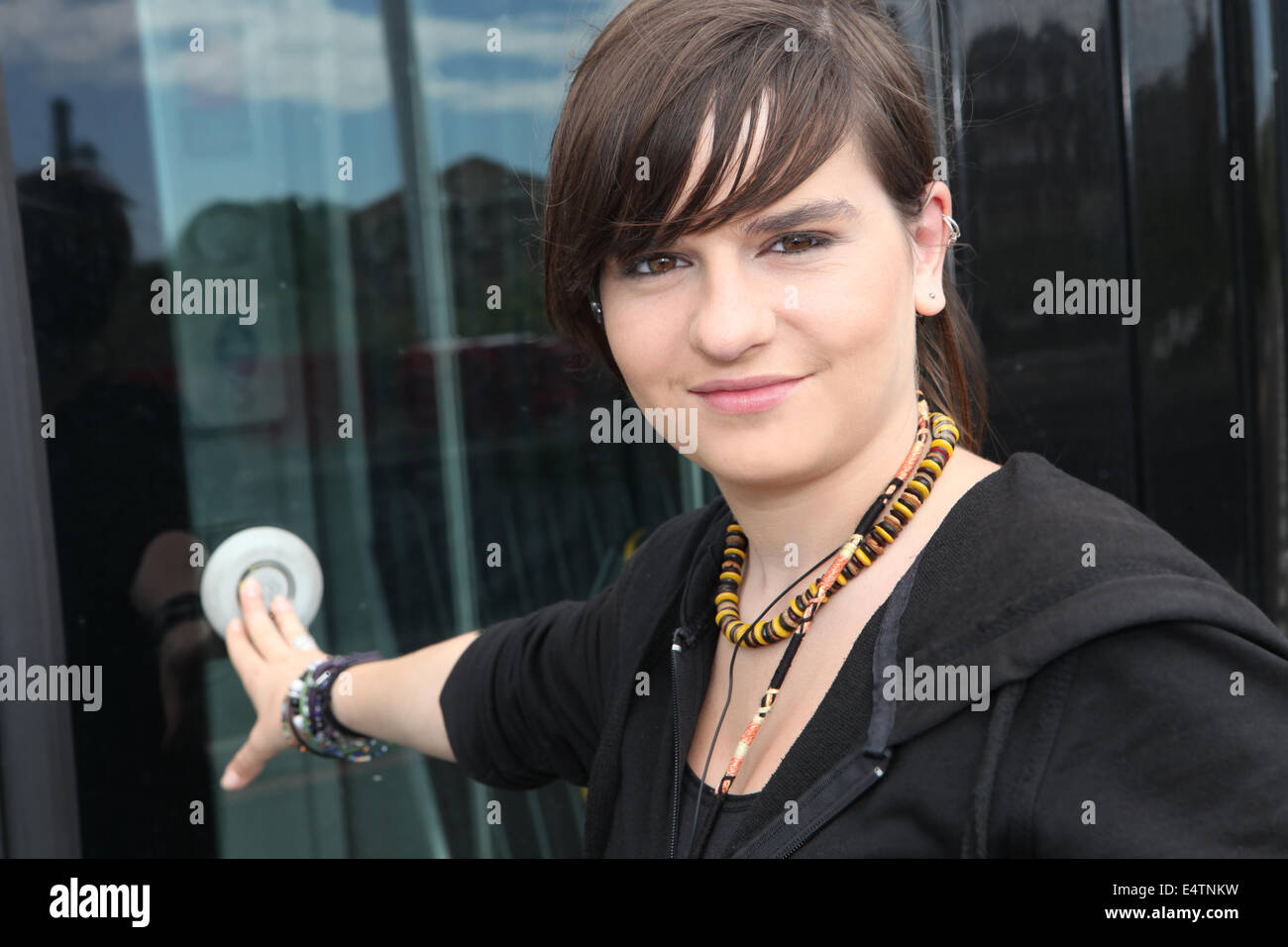 Young person pressing button Stock Photo - Alamy