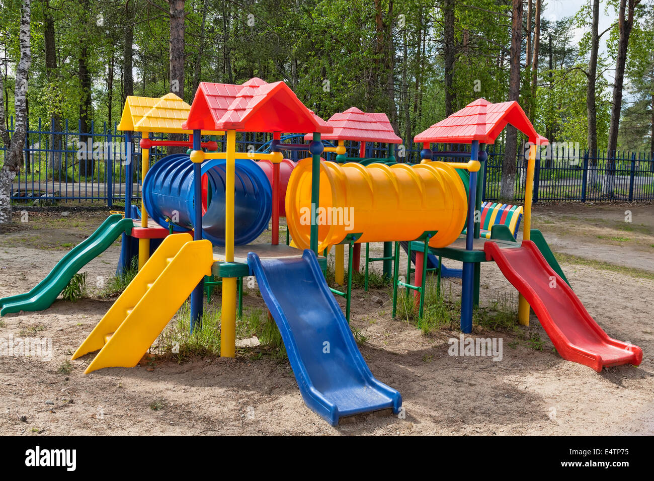 Children colorful playground in park Stock Photo - Alamy