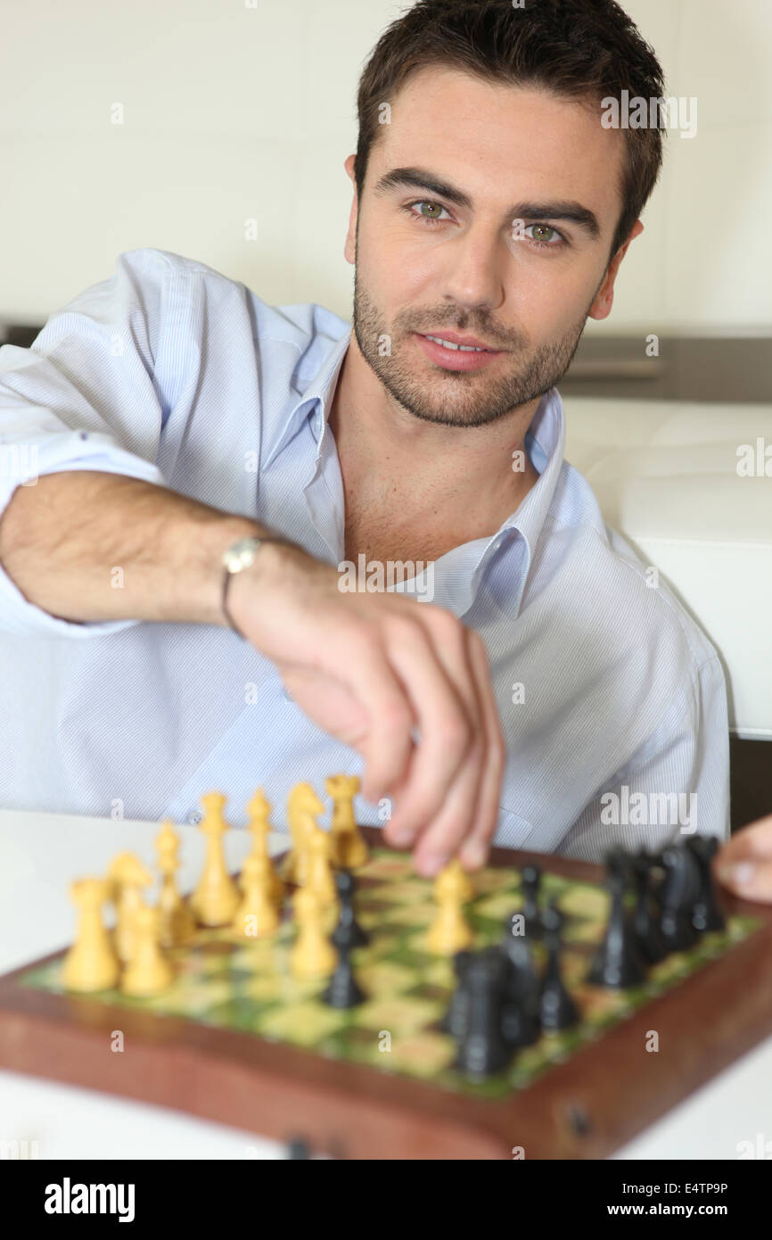 Man playing chess Stock Photo - Alamy