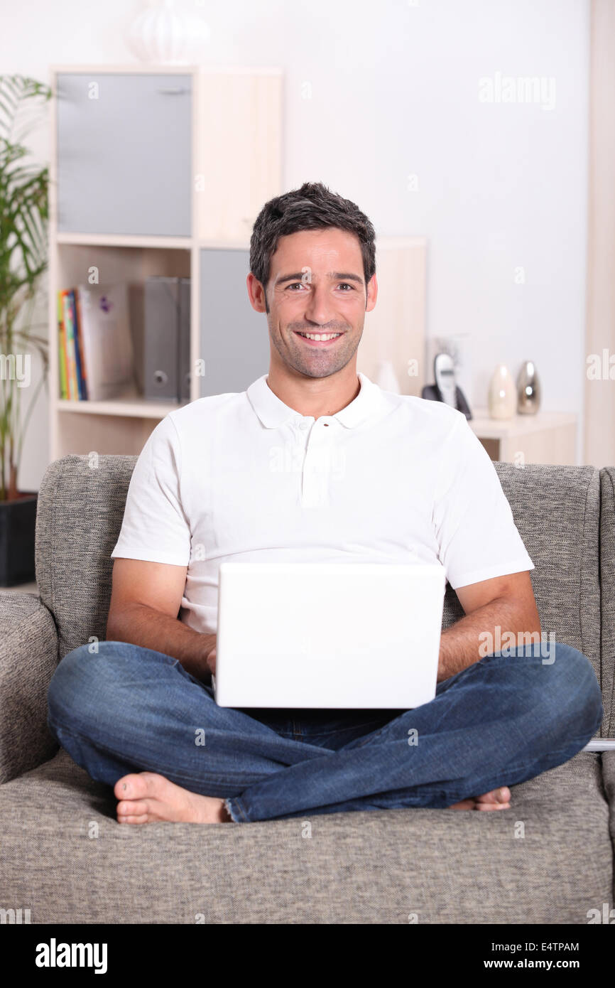 Sat down with laptop hi-res stock photography and images - Alamy
