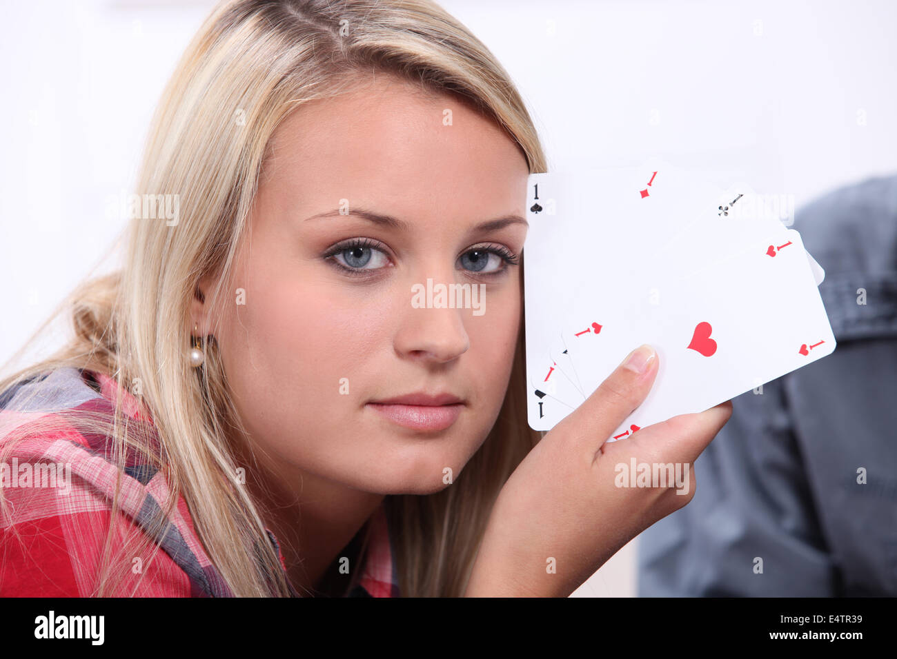 Girl showing cards Stock Photo - Alamy