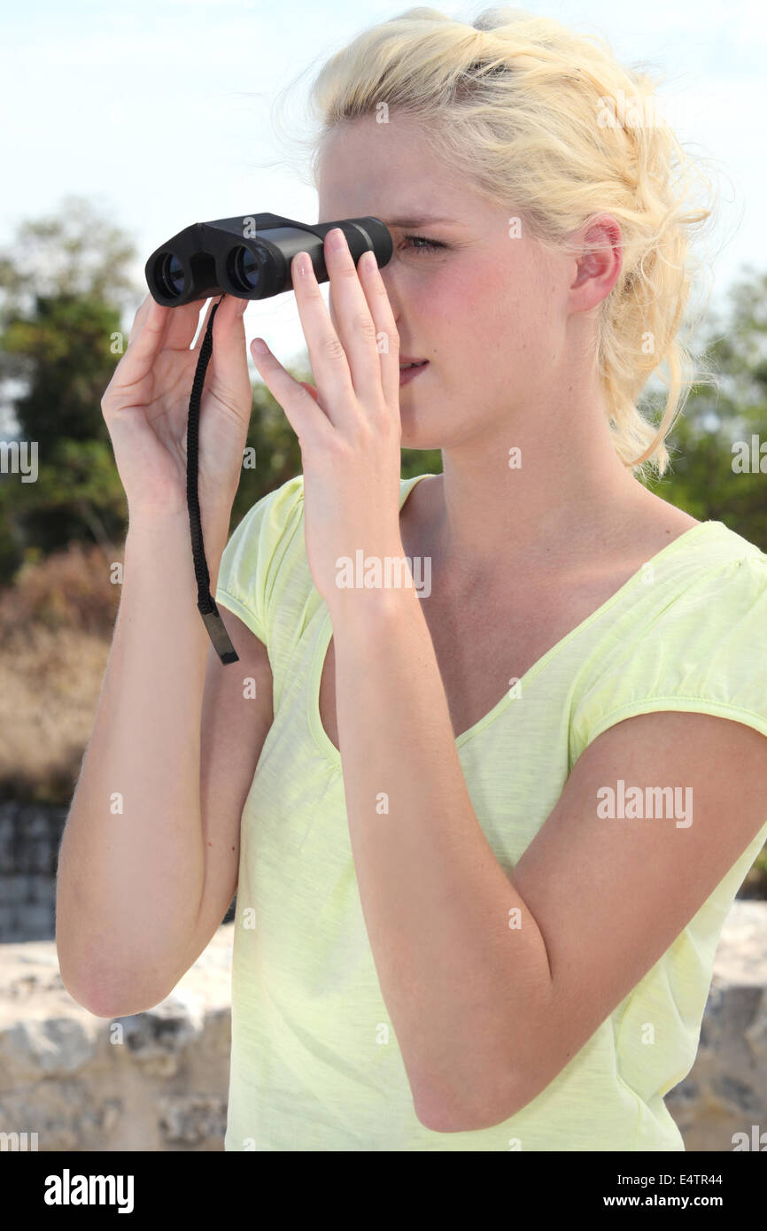 Woman binoculars foliage hi-res stock photography and images - Alamy
