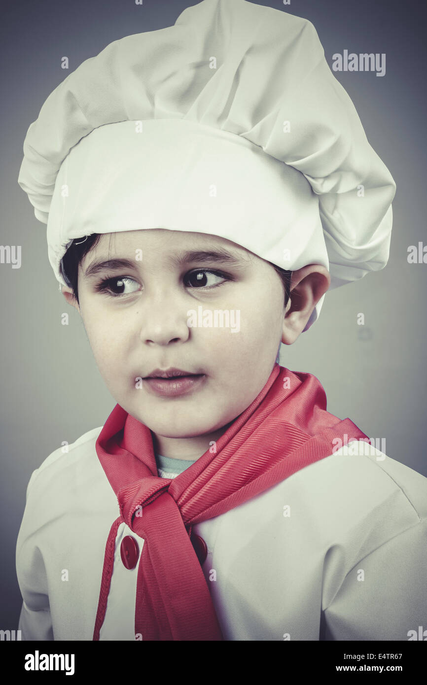 cook, child dress funny chef, cooking utensils Stock Photo - Alamy