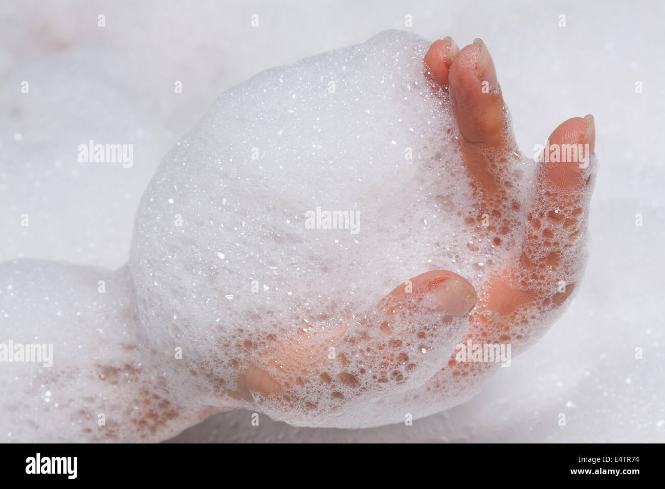 hand in suds Stock Photo - Alamy