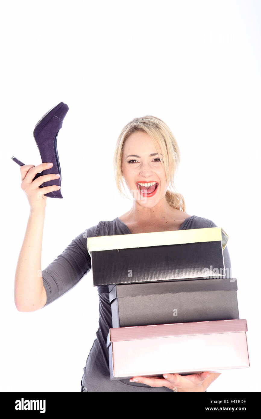Blonde Woman Holding Boxes of Shoes Stock Photo - Alamy