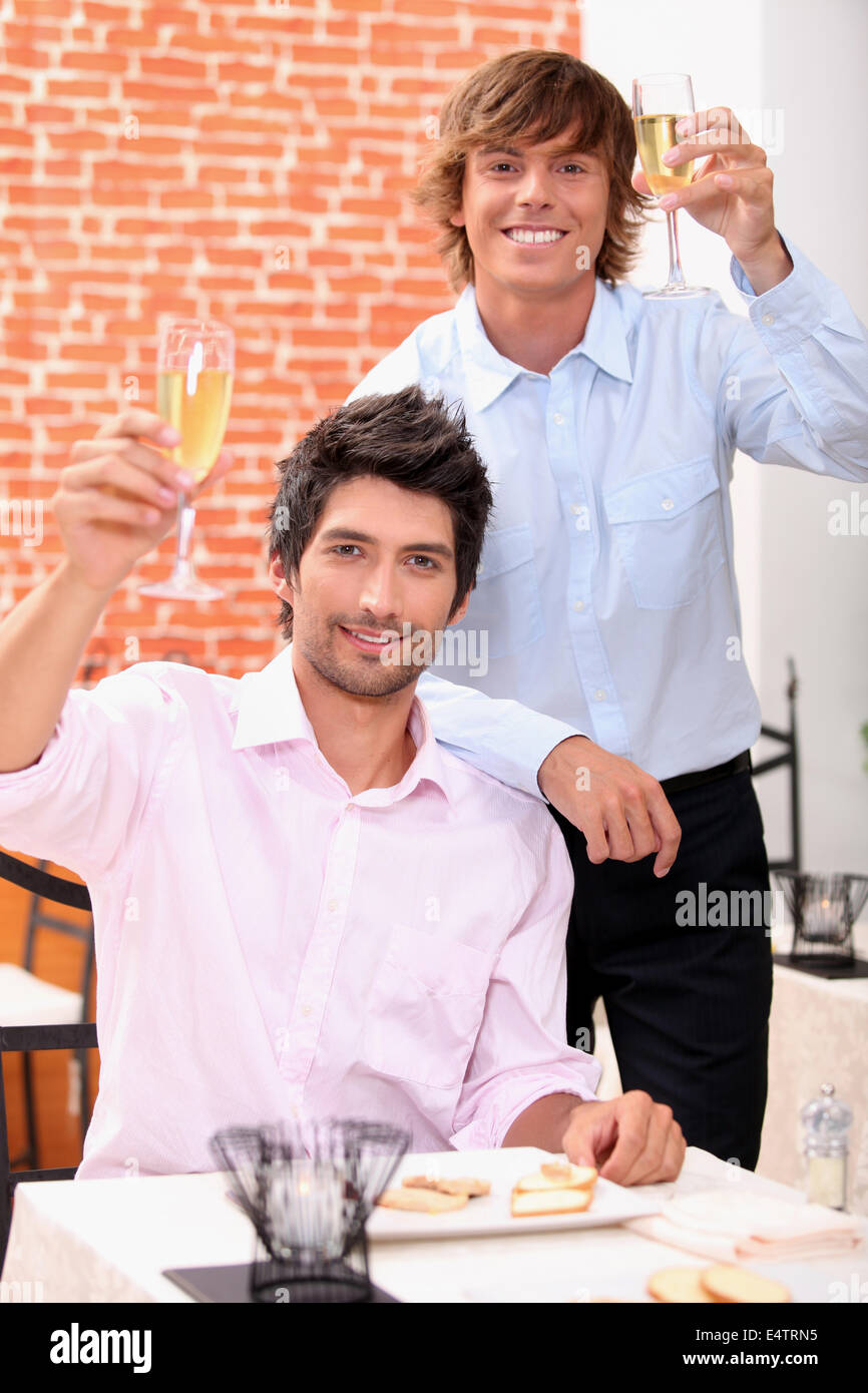 Friends toasting with champagne Stock Photo - Alamy