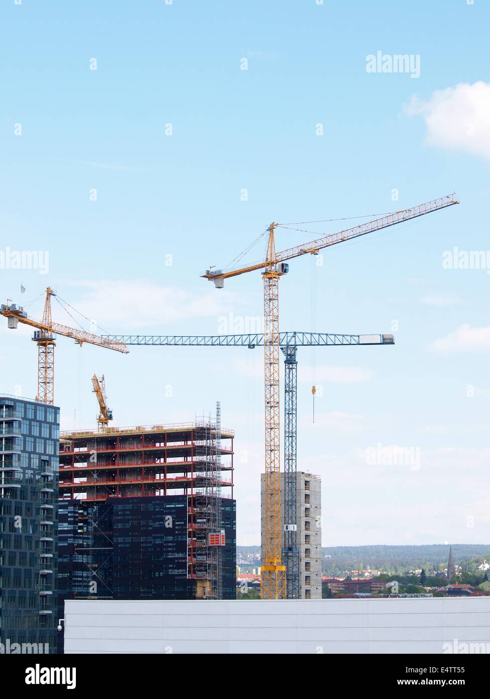 Construction site, tall cranes Stock Photo - Alamy