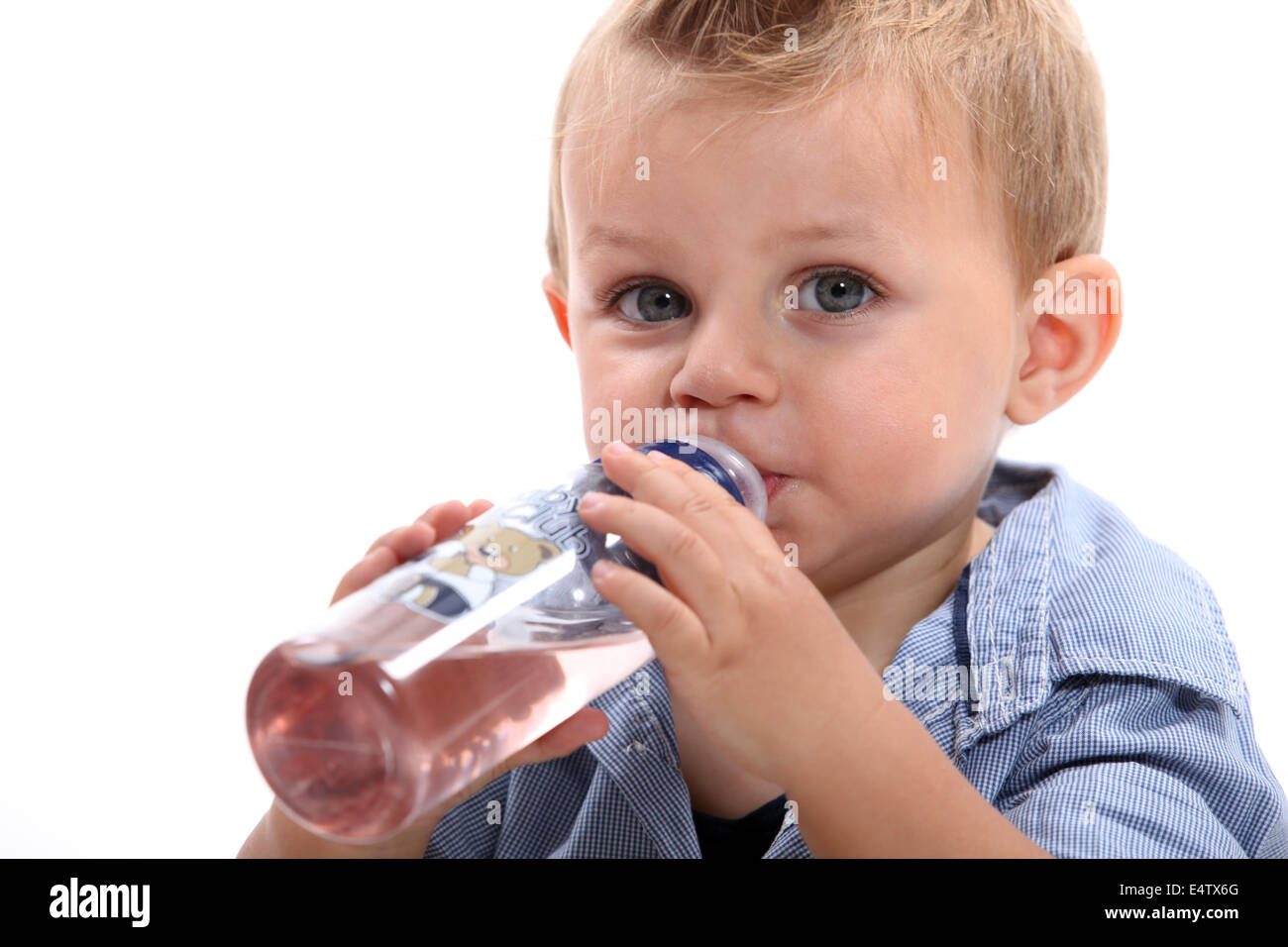 Little boy drinking water Stock Photo - Alamy