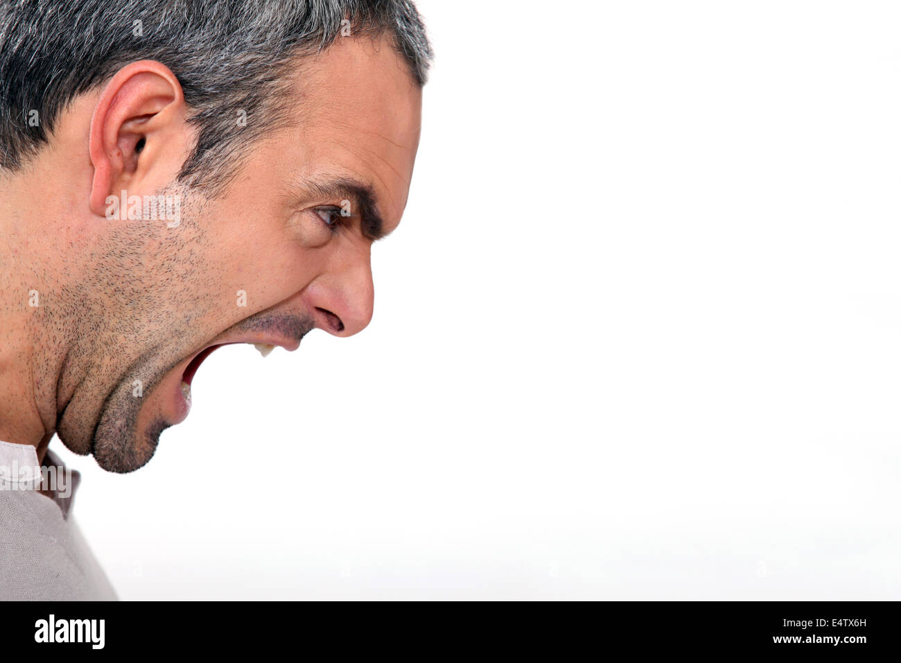 An angry man yelling Stock Photo - Alamy