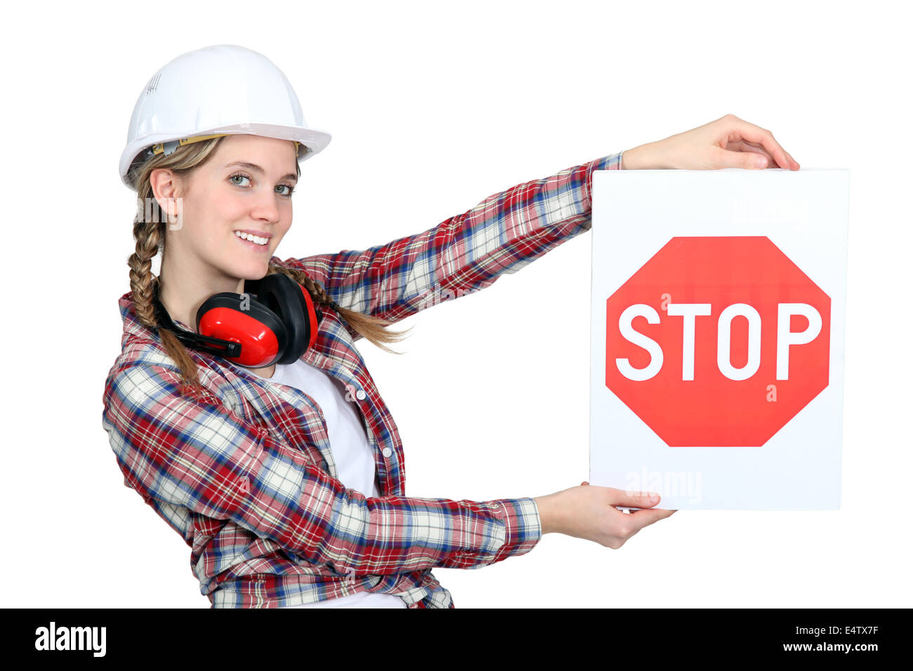 Female construction worker with sign Stock Photo - Alamy