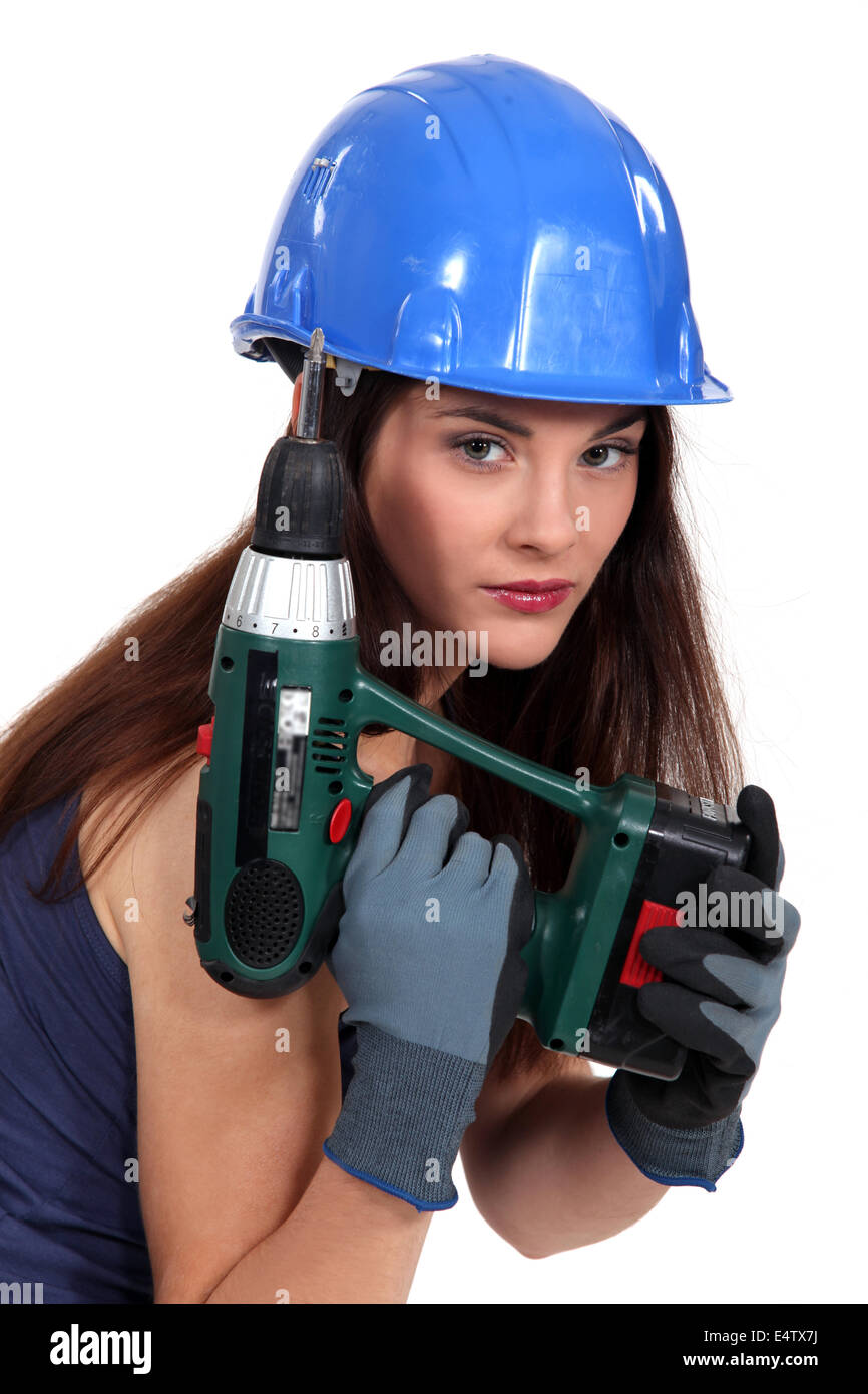Pretty girl with screwdriver Stock Photo - Alamy