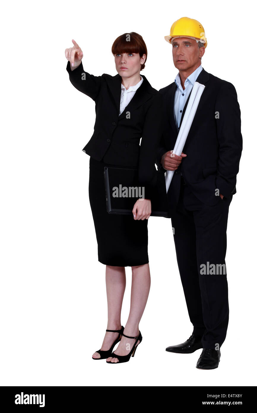 Architect pointing into the distance Stock Photo - Alamy
