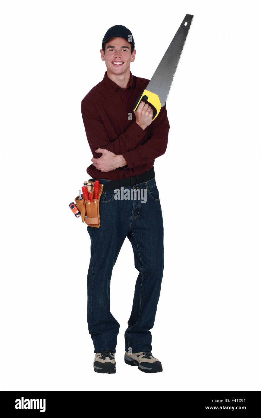 Handyman with a handsaw Stock Photo - Alamy
