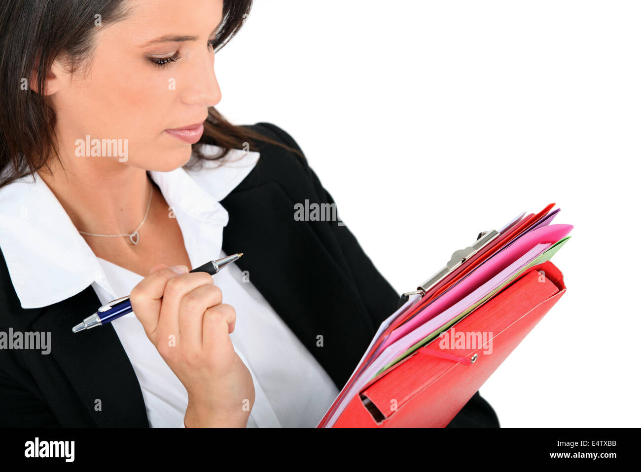 Woman reviewing notes Stock Photo - Alamy
