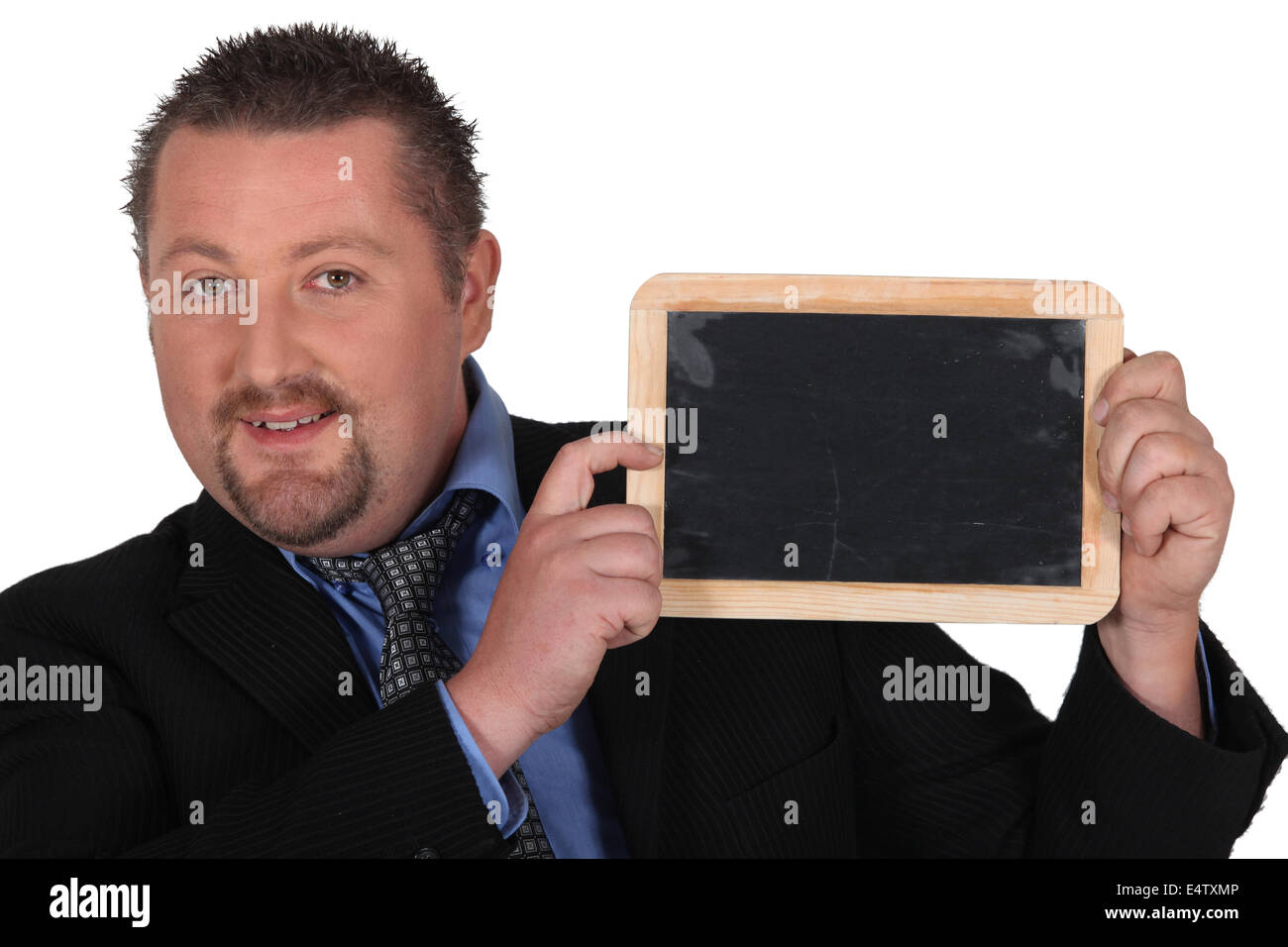 Businessman holding up a chalkboard Stock Photo - Alamy Businessman holding up a chalkboard Stock Photo - Alamy