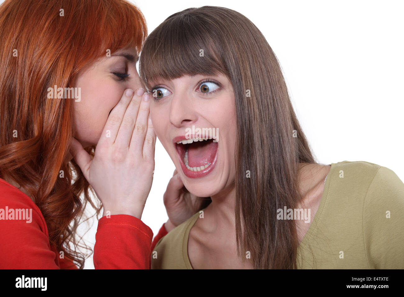 Women sharing a shocking secret Stock Photo - Alamy
