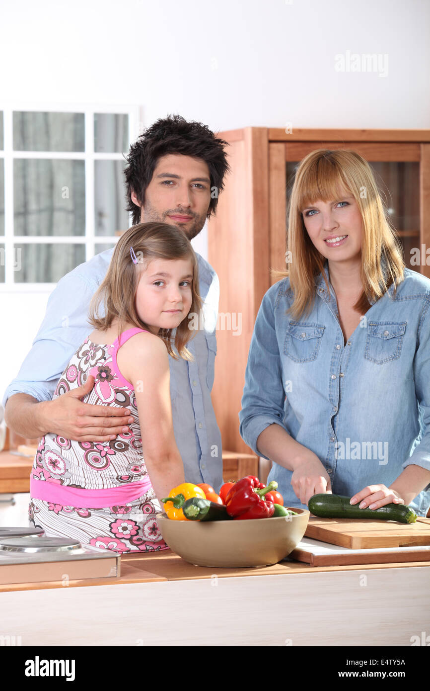 Family in kitchen Stock Photo - Alamy
