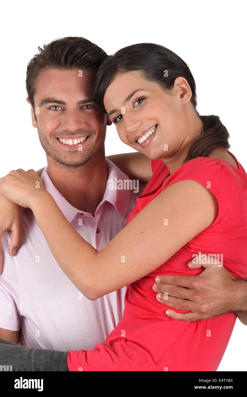 Boyfriend carrying girlfriend Stock Photo - Alamy