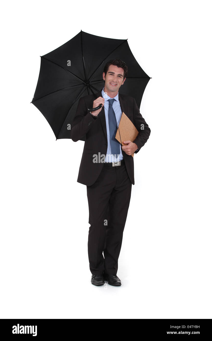 Businessman wearing suit standing Cut Out Stock Images & Pictures - Alamy
