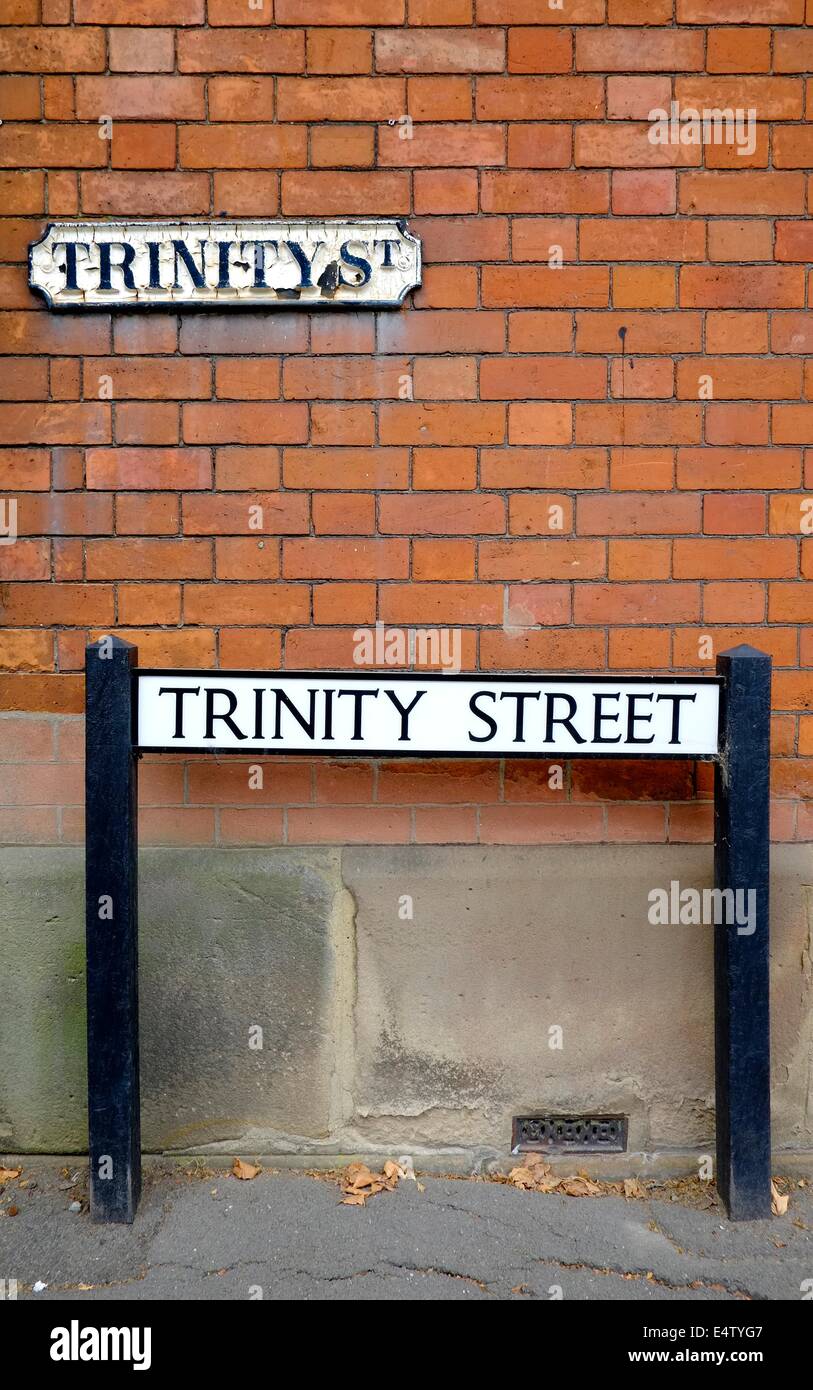 Trinity street sign on a brick wall Derby England UK Stock Photo - Alamy