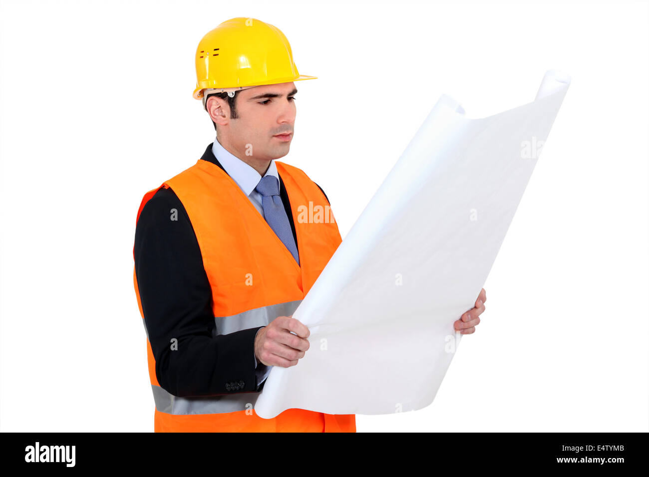 Male architect reading documents construction hi-res stock photography ...