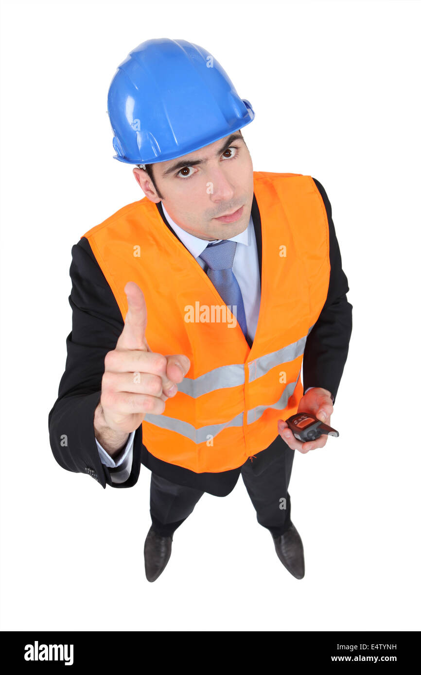 Engineer giving a warning Stock Photo - Alamy