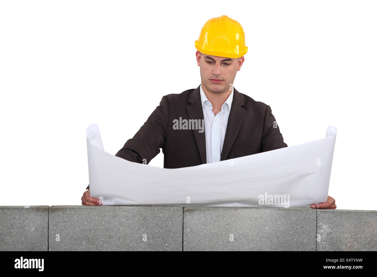 Man looking over a wall Stock Photo - Alamy