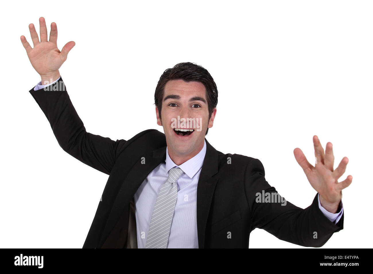 happy businessman raising hands Stock Photo - Alamy