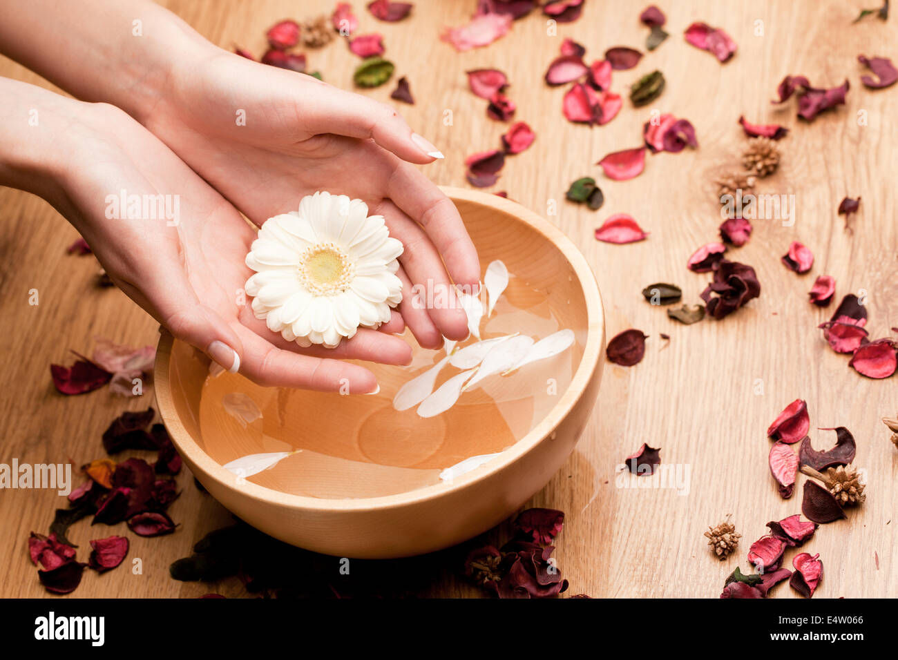 Spa.Woman's Hands with flower Stock Photo - Alamy