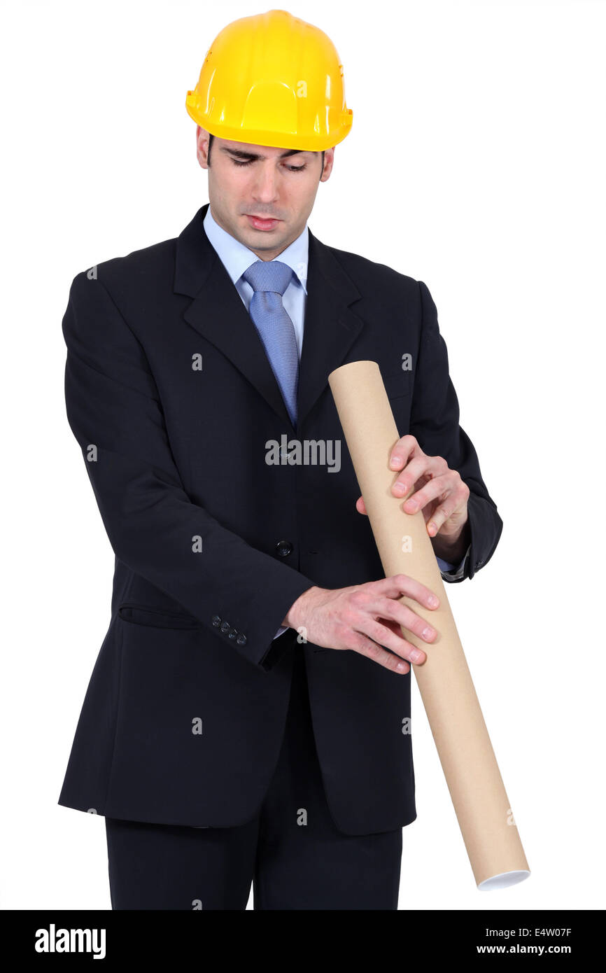 Man peering down a cardboard tube Stock Photo - Alamy