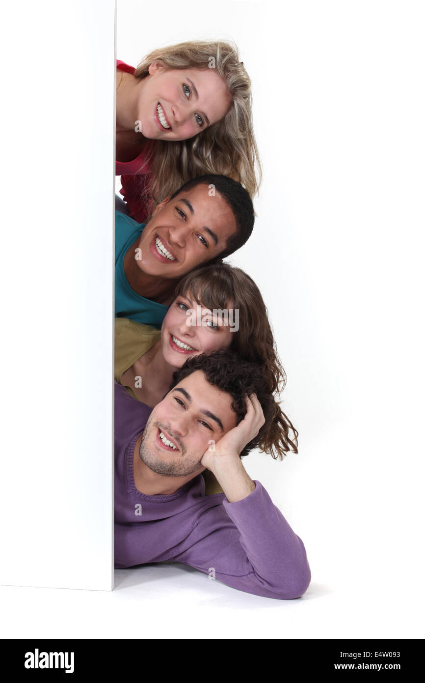 Friends laying by blank advertising Stock Photo - Alamy