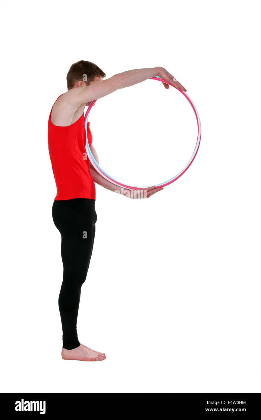 Man with a hula hoop Stock Photo - Alamy