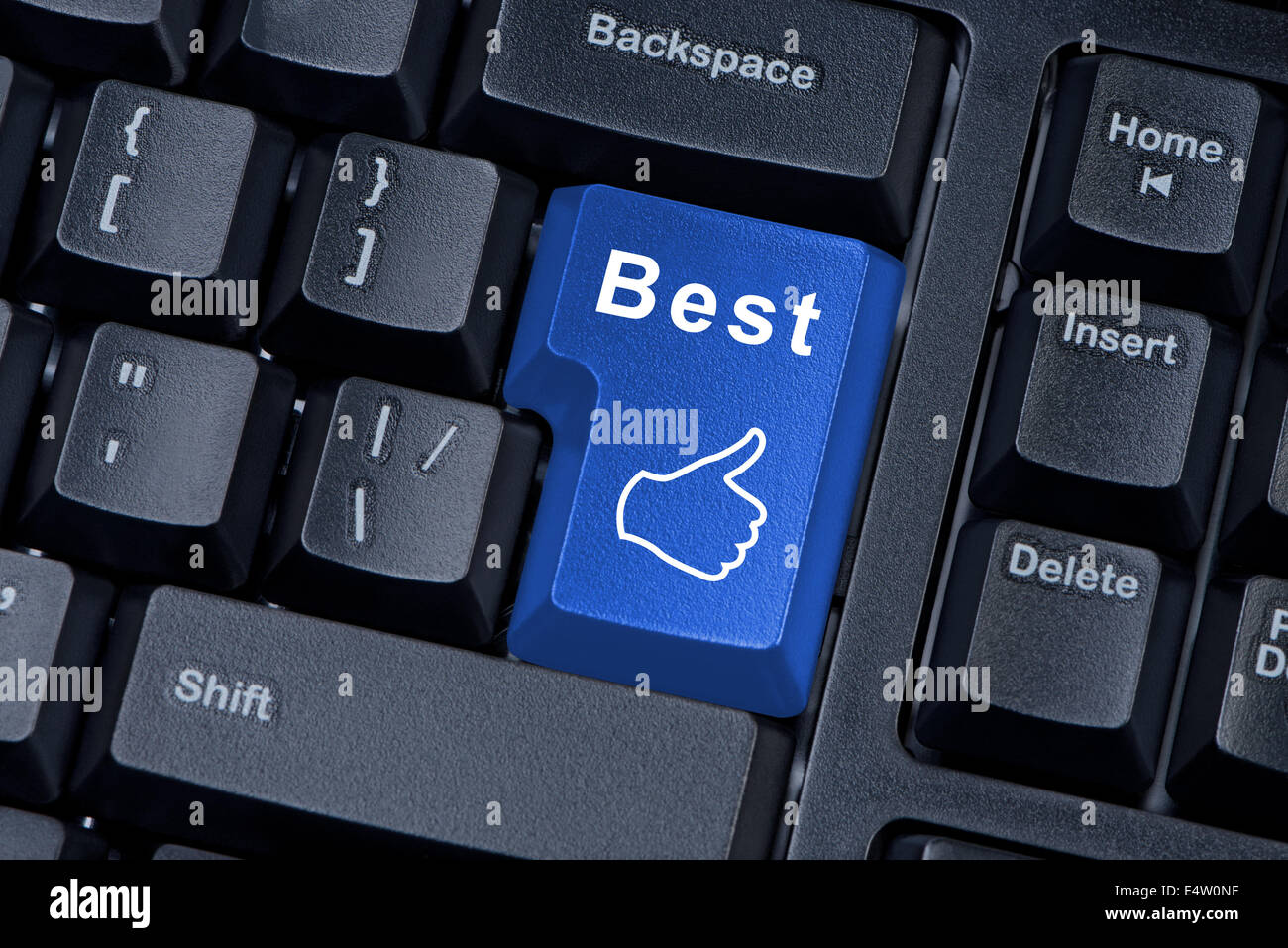 Computer keyboard button with a thumb up Stock Photo - Alamy