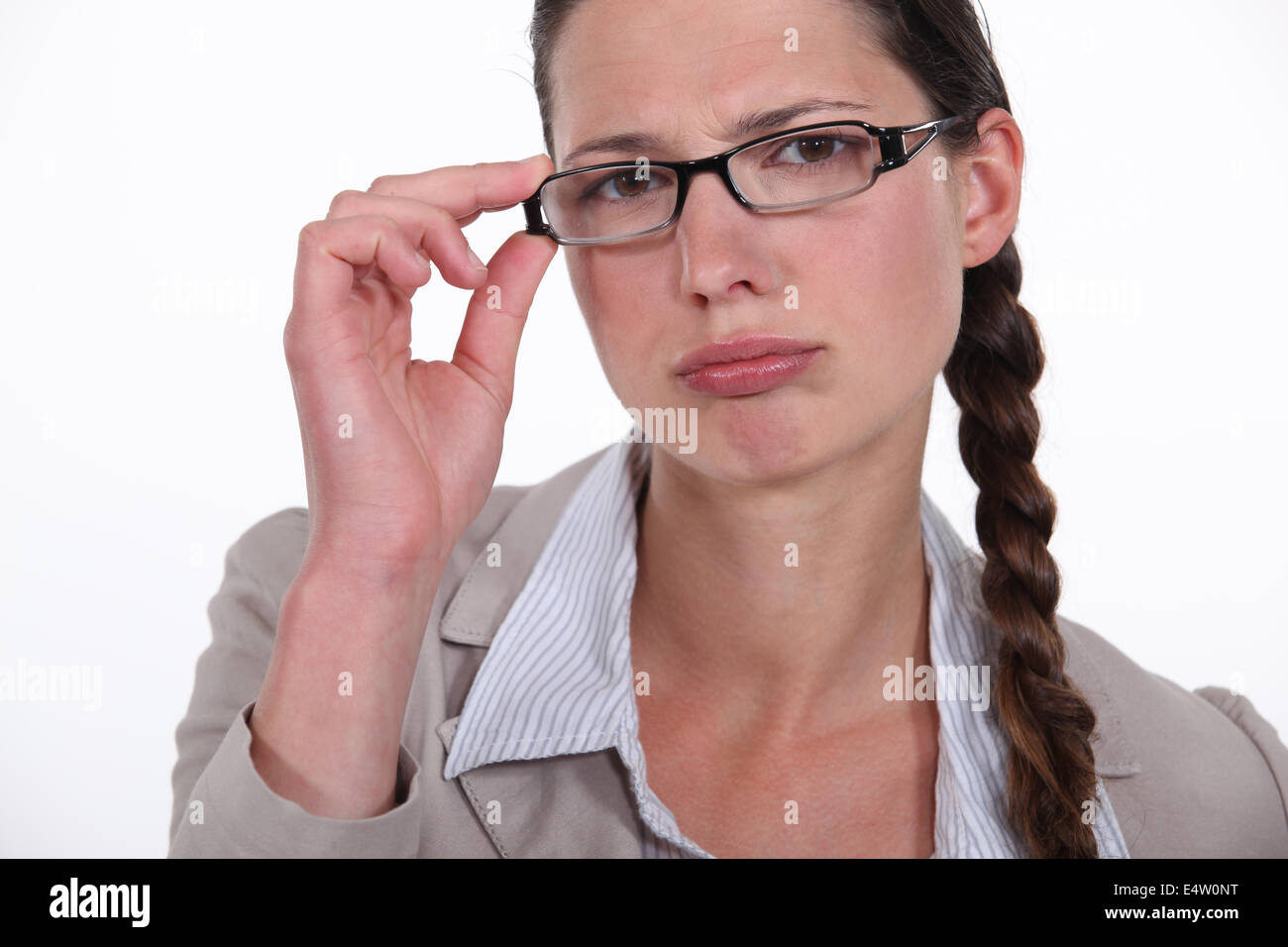 Portrait of a young woman pouting Stock Photo - Alamy
