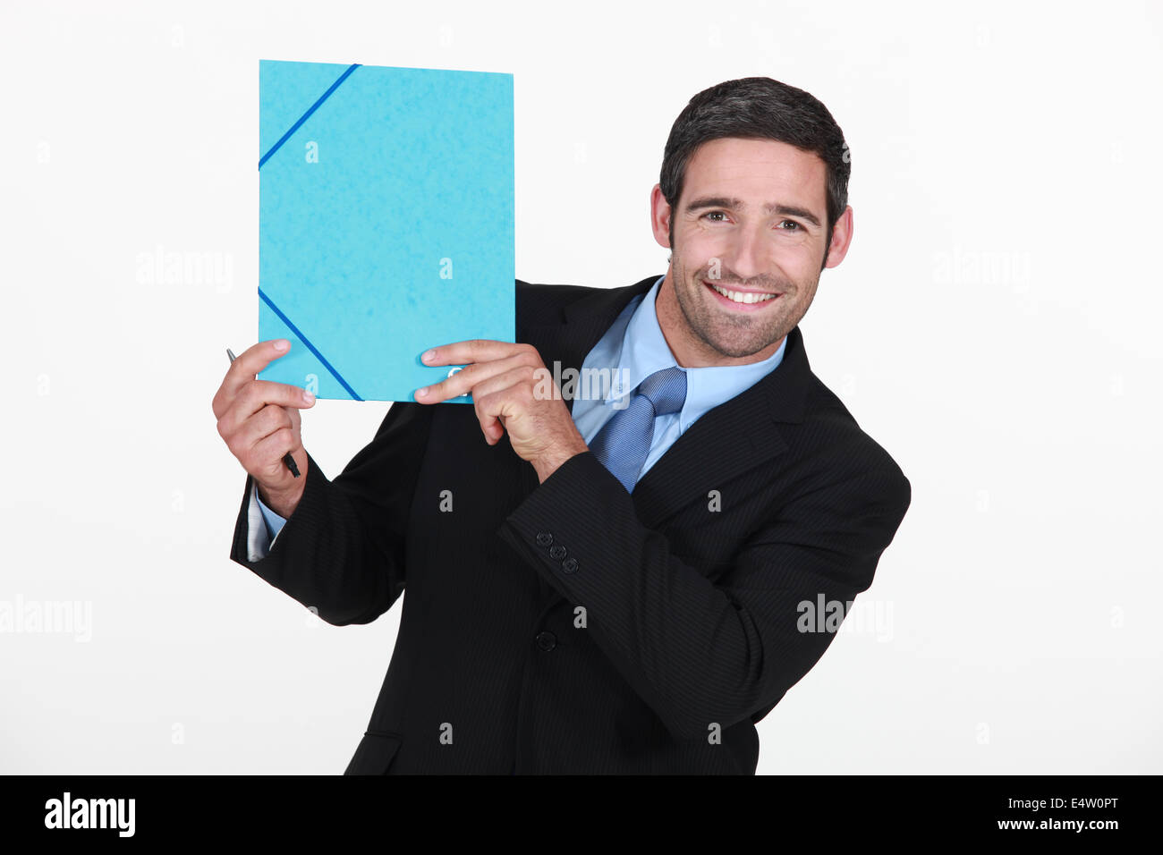 businessman all smiles holding file Stock Photo - Alamy