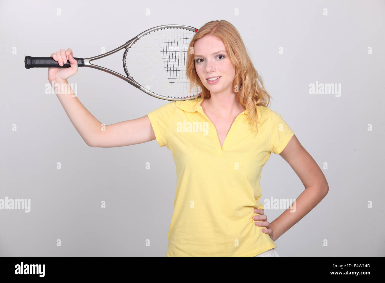 Girl with tennis racket Stock Photo - Alamy