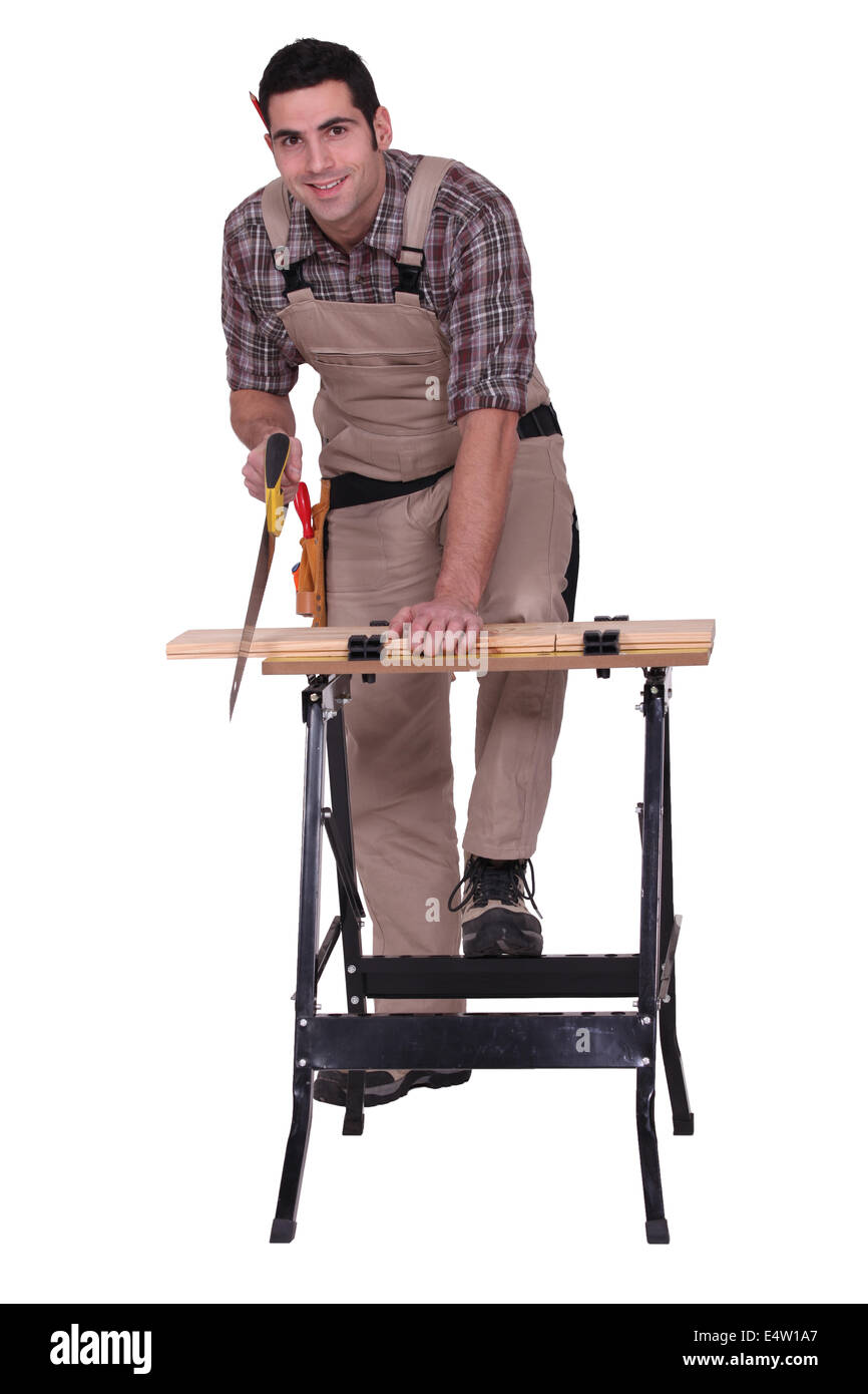 Carpenter operating wood cutting saw hi-res stock photography and ...
